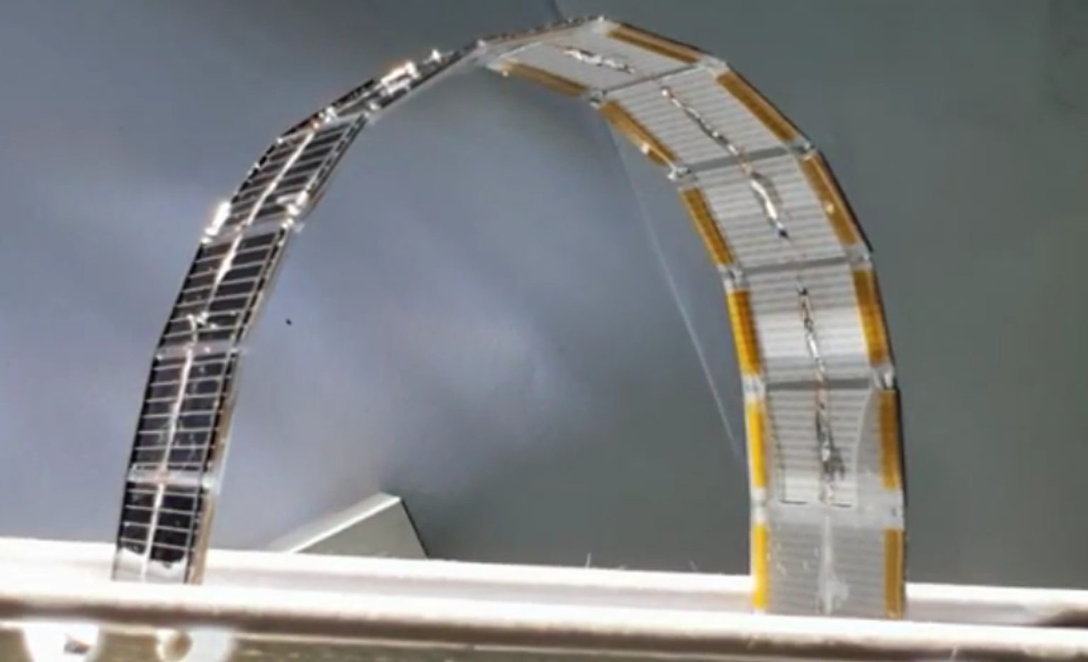 Sun-tracking tessellated photovoltaic array for use in space-restricted ...