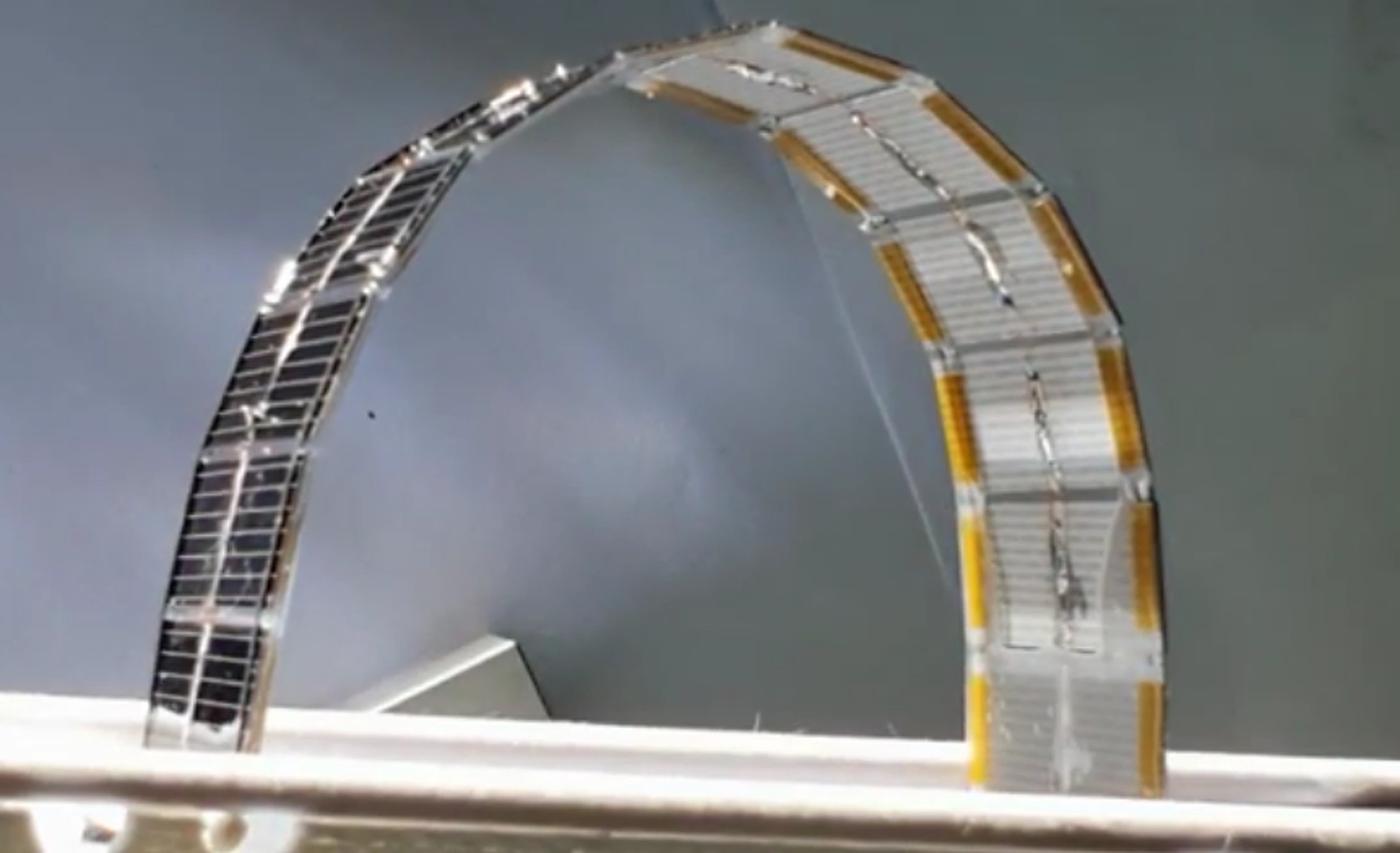 Sun-tracking tessellated photovoltaic array for use in space-restricted ...